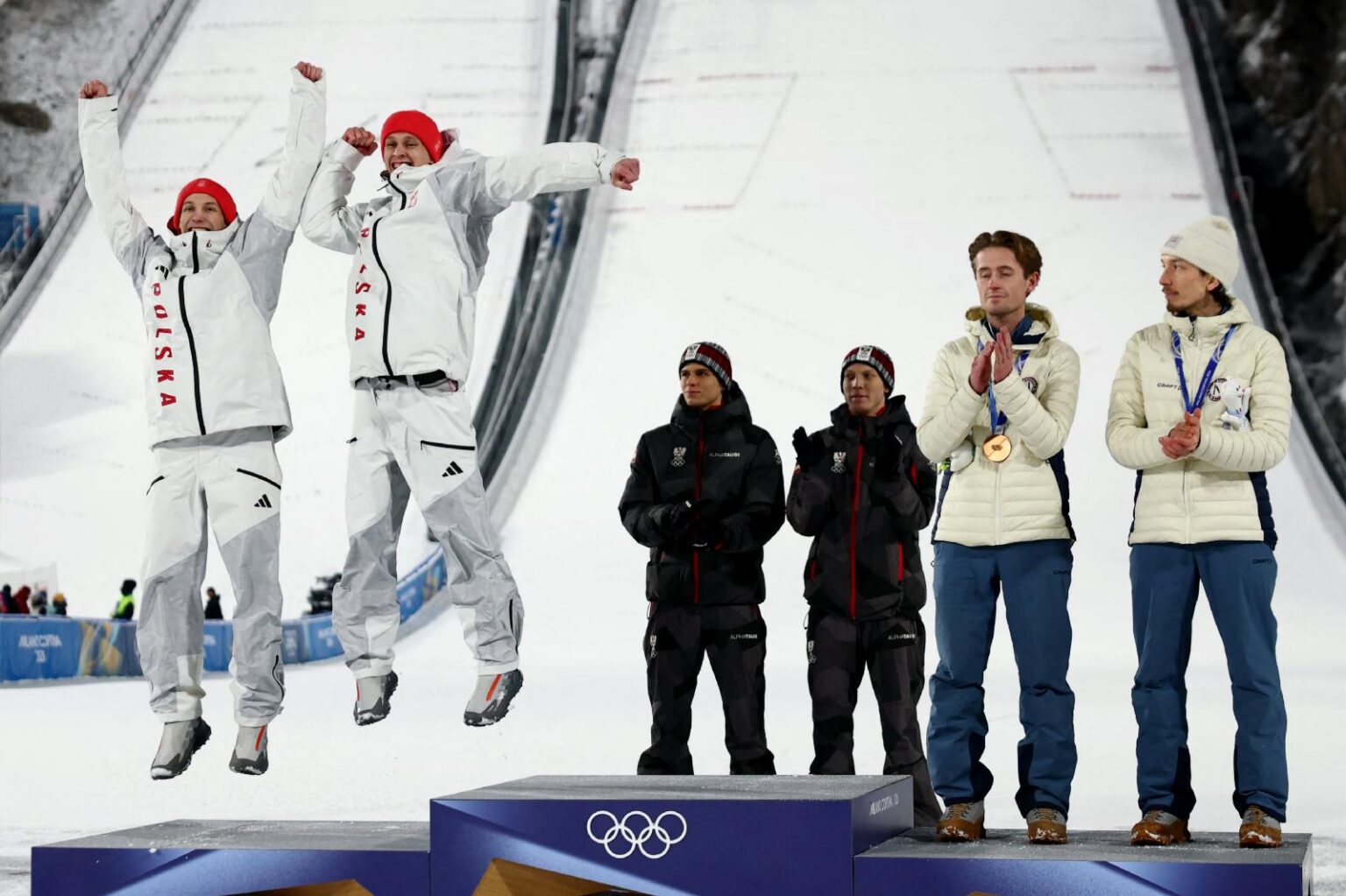 Olympic ski jumping silver, bronze medals lay on altar as young athlete ...